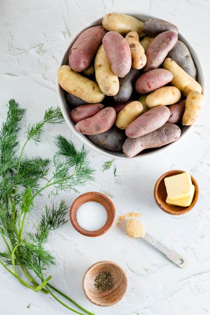 Roasted Garlic and Dill Fingerling Potatoes - Savory Suitcase